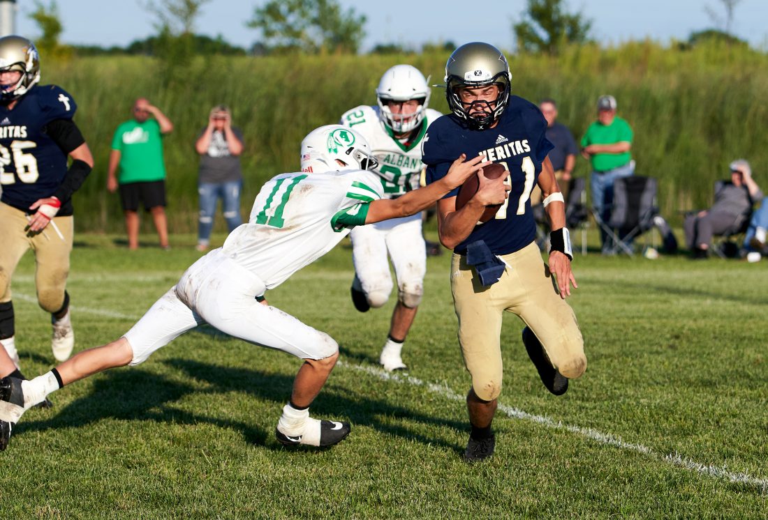 Veritas football suffers 48-0 loss to Albany in season opener | News ...